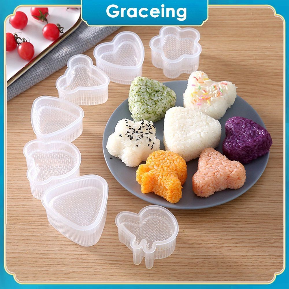 Molde de bola de arroz triangular criativo dos desenhos animados do ...