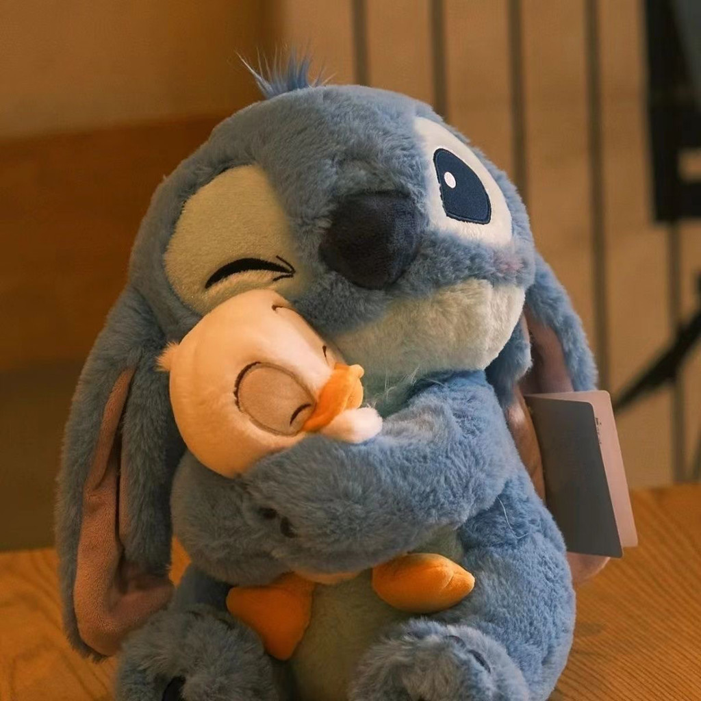 Boneca Lilo & Stitch Costura Segurando O Pato Donald Costurando ...