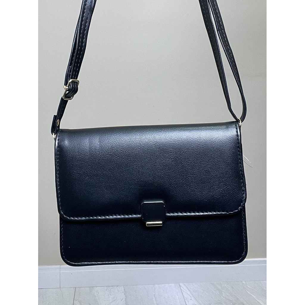 Bolsa Feminina Transversal em Couro Sintético Miss Dong | Shopee Brasil