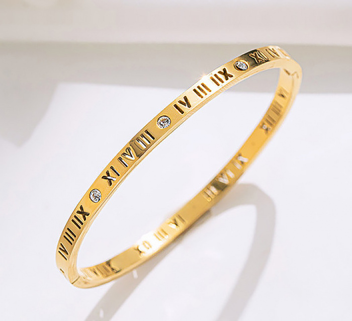 Pulseira Feminina Com Punho De Numeral Romano Em Aço Titânio Dourado ...